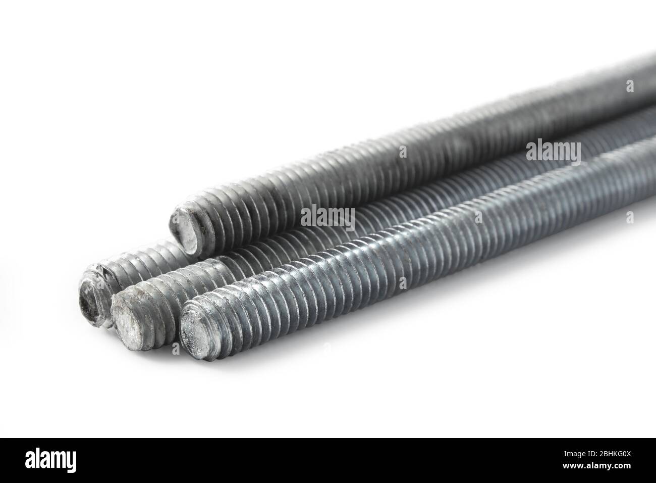 Threaded steel studs isolated on white background Stock Photo - Alamy