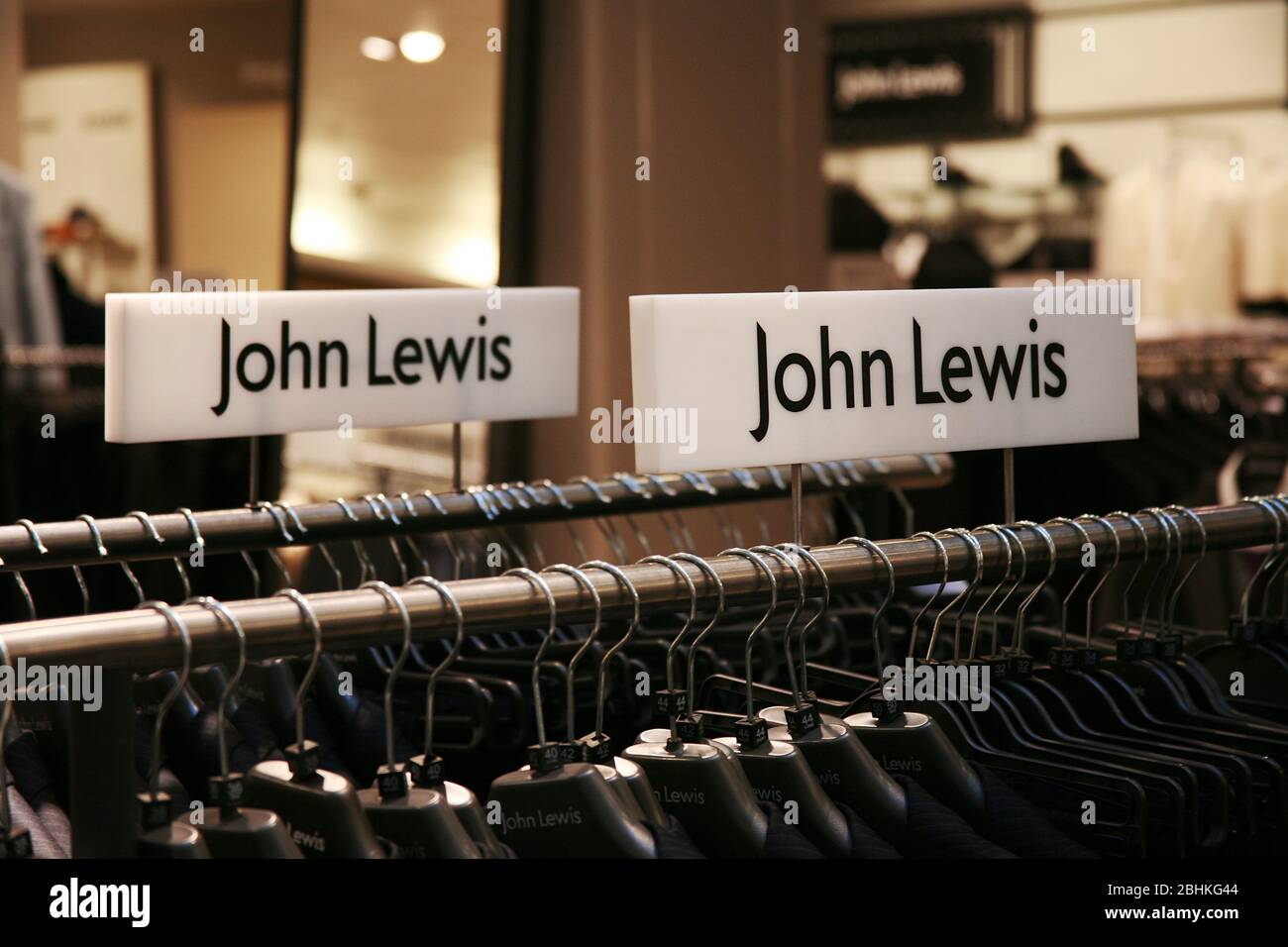 John Lewis Interior, shelves of clothing Stock Photo - Alamy