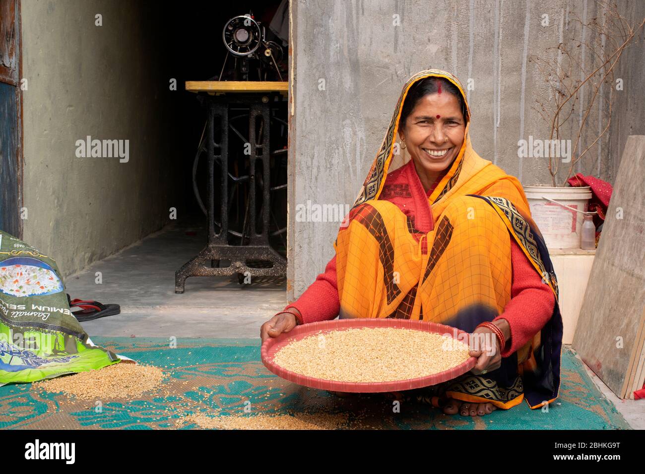 Indian woman cleaning street hi-res stock photography and images - Alamy