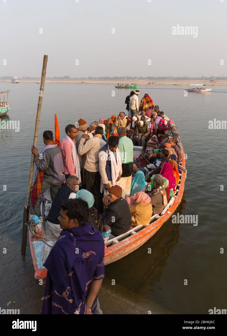 A crowded boat is ready to sail in the river Ganges Stock Photo - Alamy