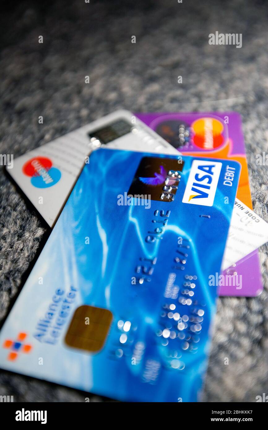 Three debit/credit cards Stock Photo - Alamy