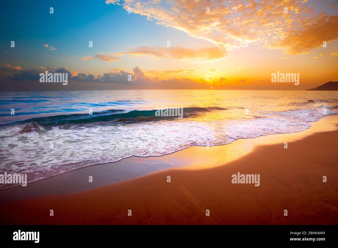 beautiful tropical sunset and sea Stock Photo - Alamy