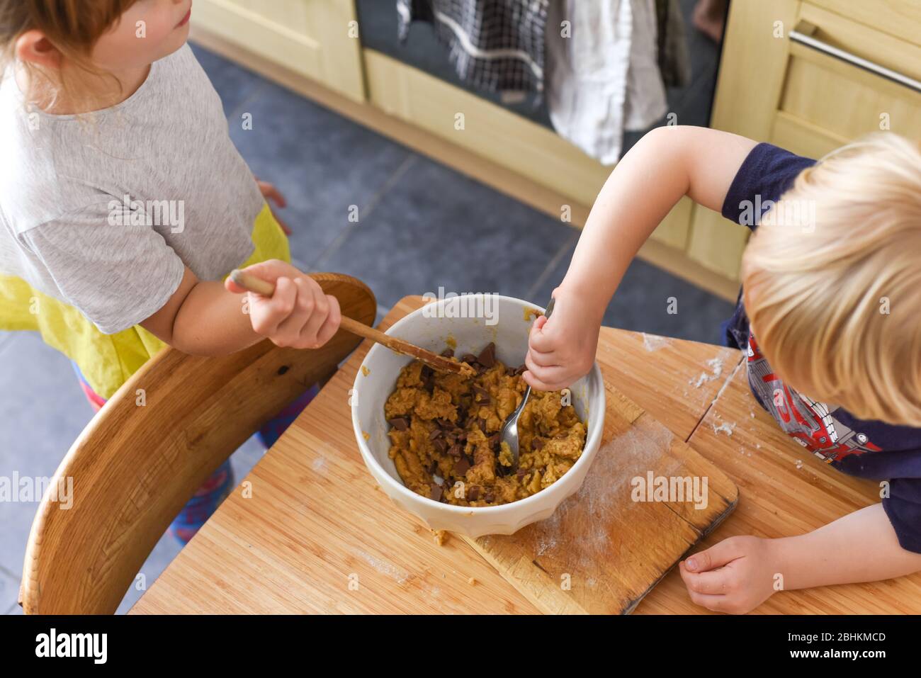 Boy girl making cake mix hi-res stock photography and images - Alamy