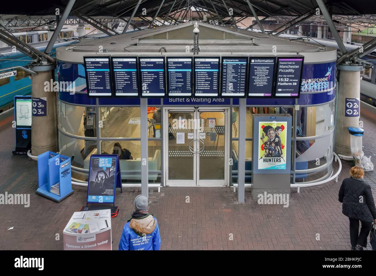 Manchester UK airport train station waiting area facade. Buffet ...