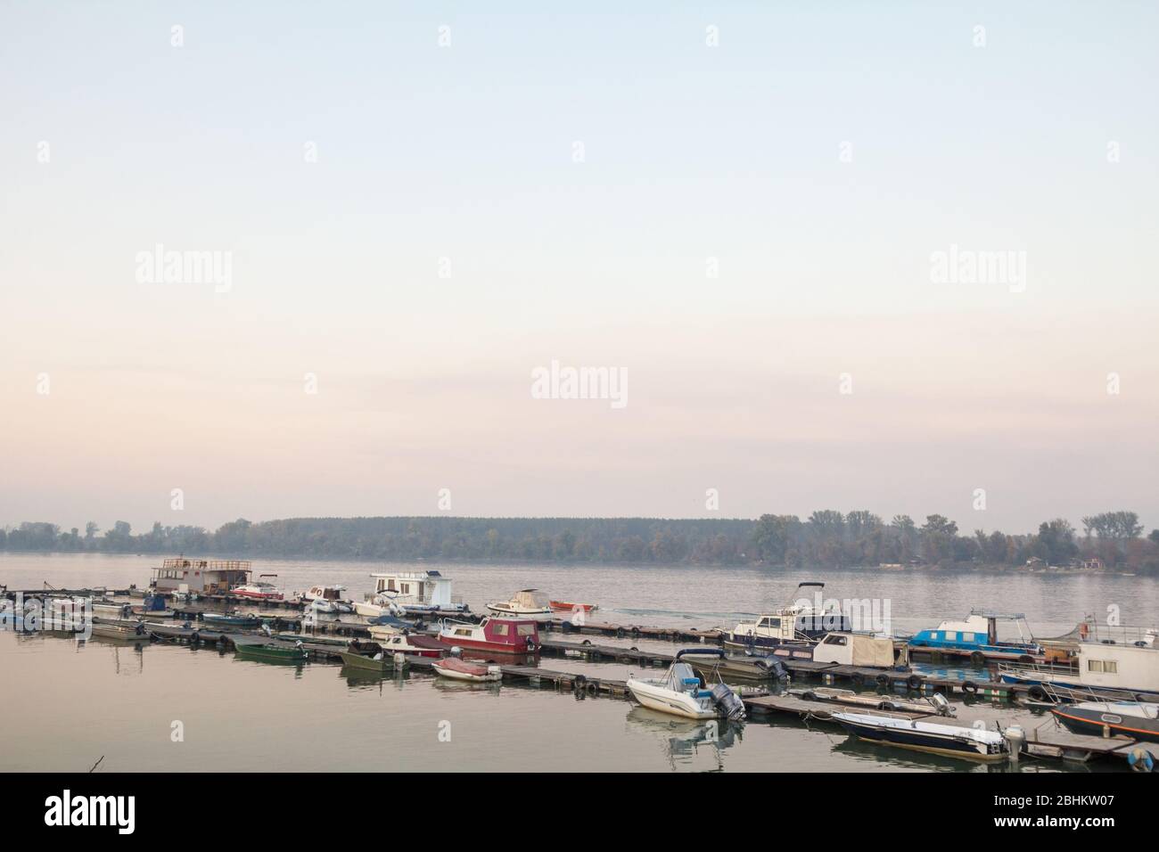 Boats anchored on the port and harbour of Zemun, on the typical pontoon ...