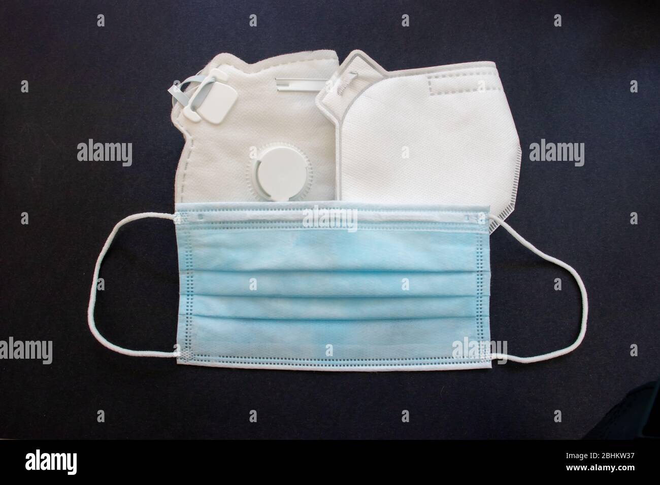 Surgical mask with rubber ear straps. Typical 3-ply surgical mask ...