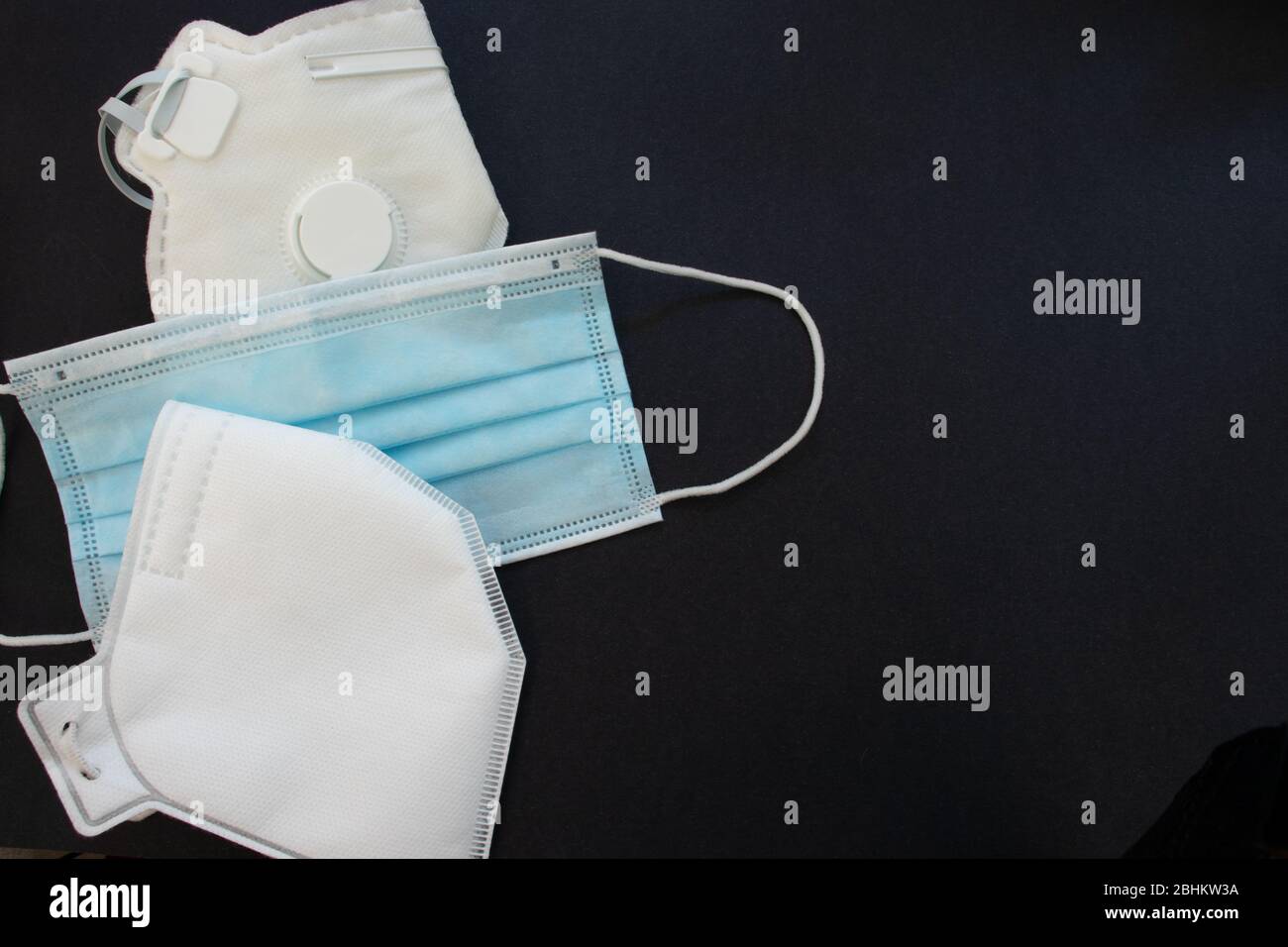 Surgical mask with rubber ear straps. Typical 3-ply surgical mask ...