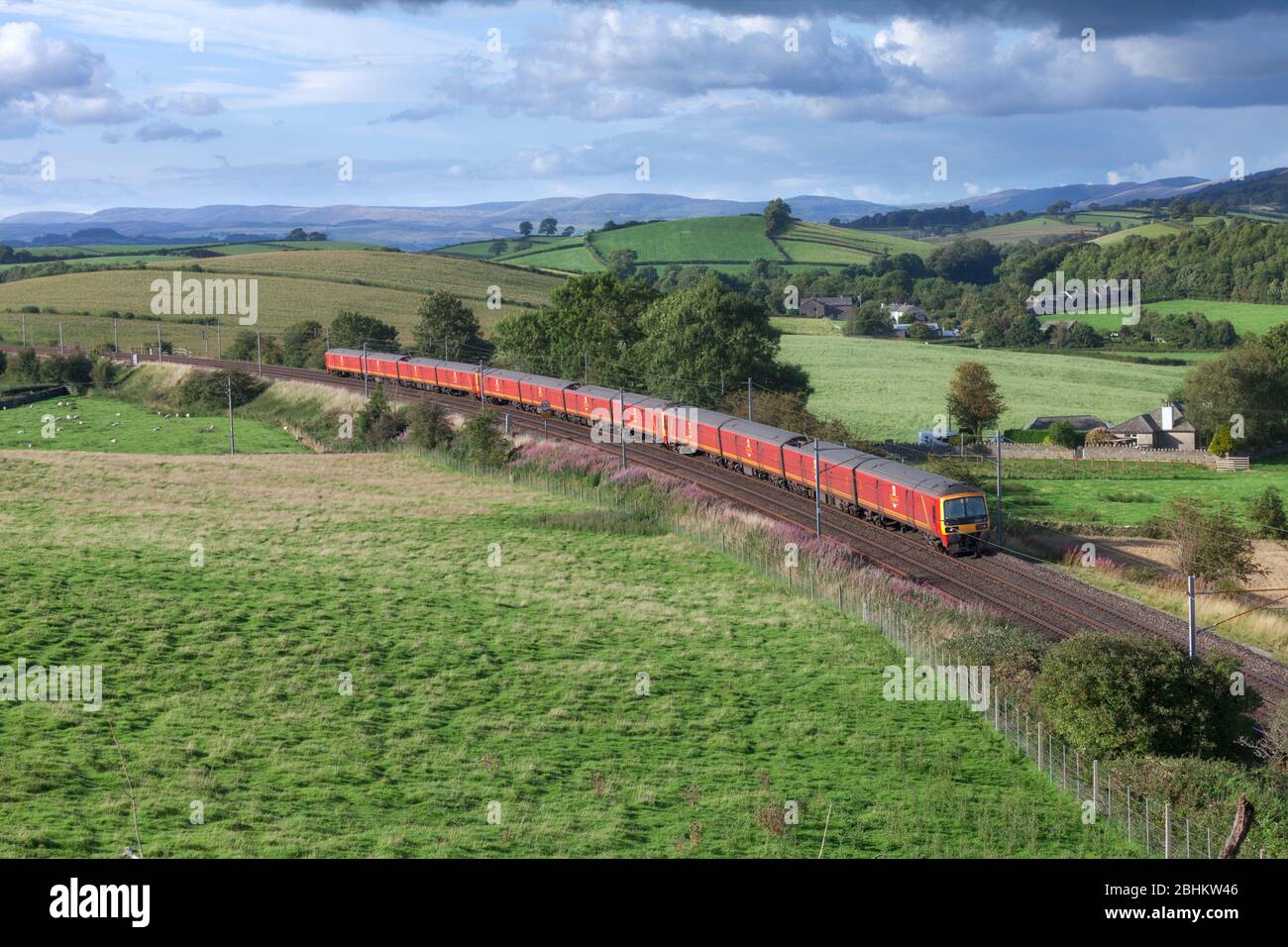 3 Royal Mail Class 325 postal trains pass Hincaster (north of Carnforth ...