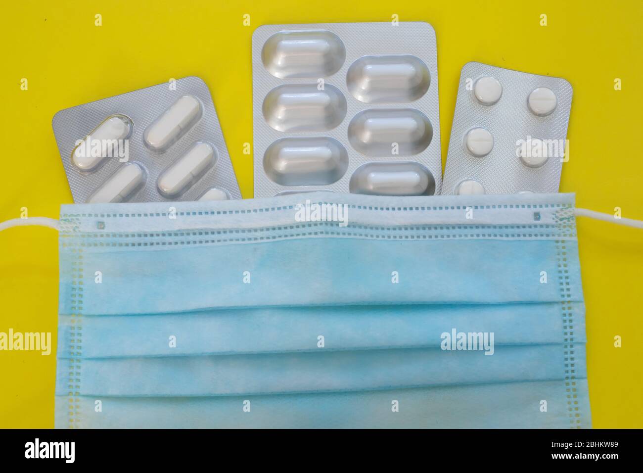 Surgical mask with rubber ear straps. Typical 3-ply surgical mask ...