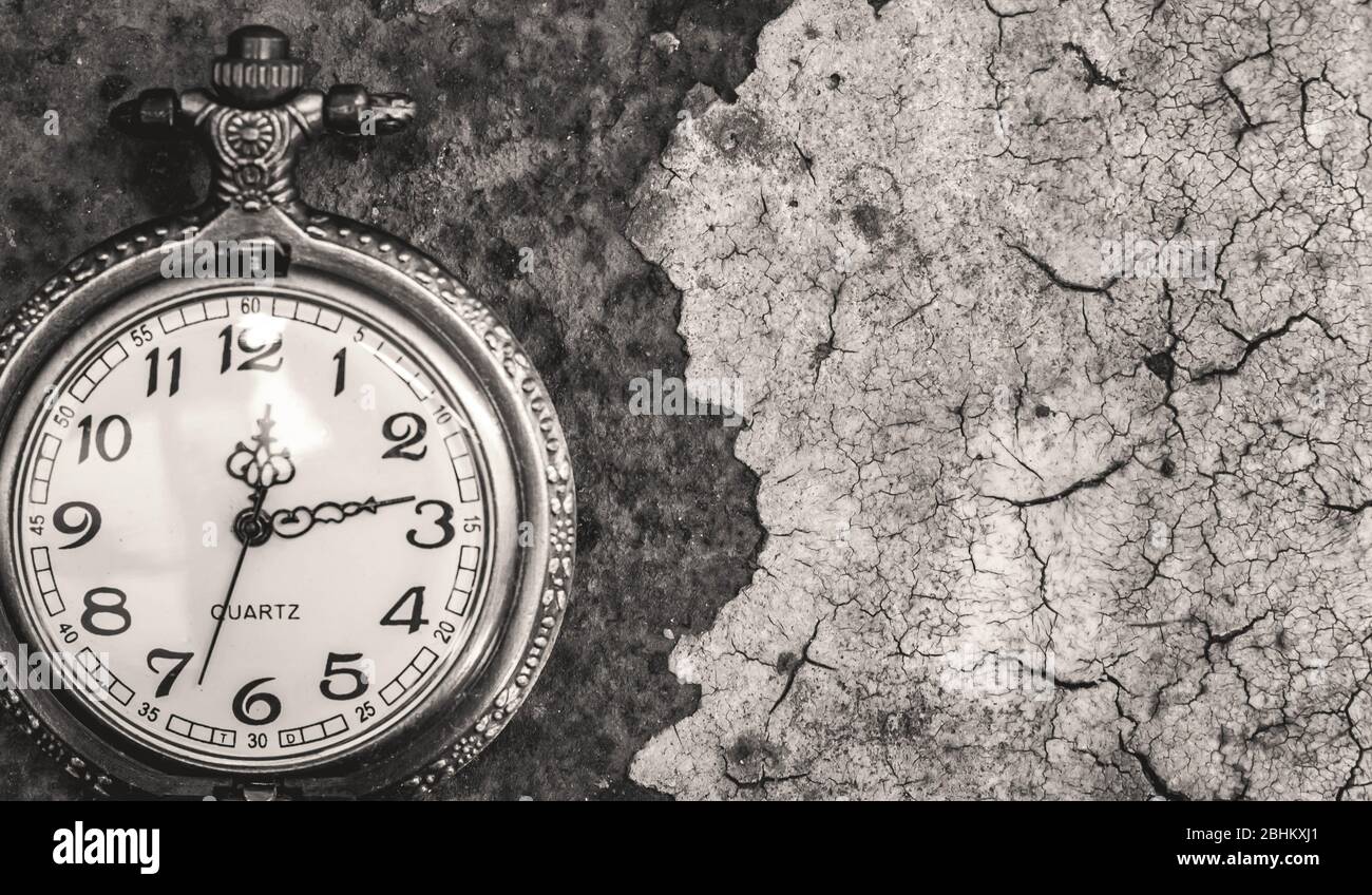 Vintage pocket watch showing time with textured background. concept of ...