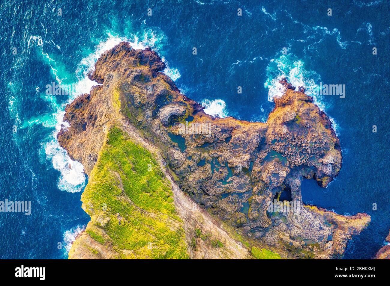 Top Down cliffs and coast line with waves breaking, post processed in ...