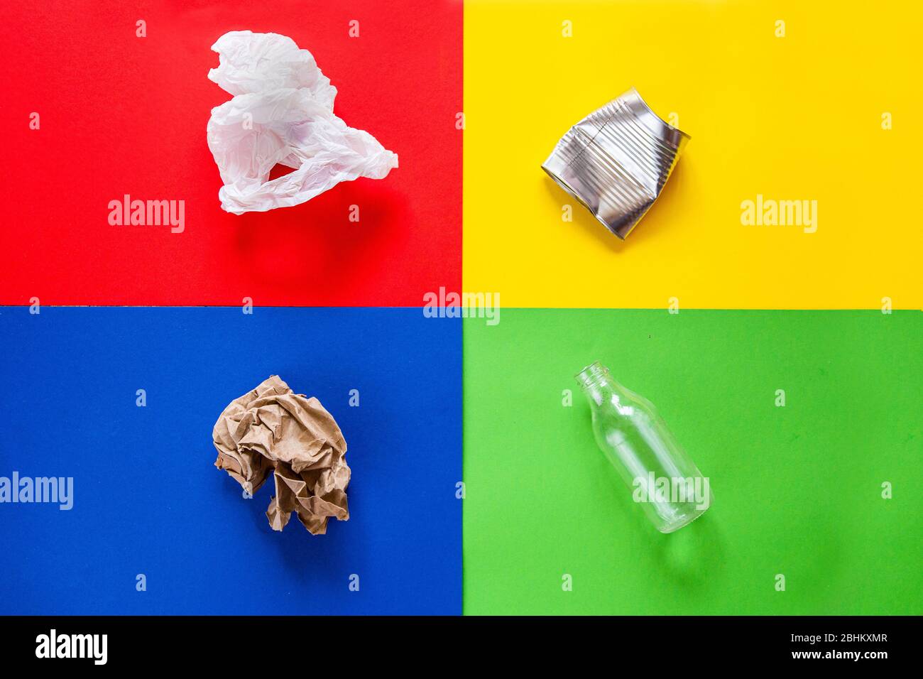 Trash sorting concept. Four colors background for sorting metal, glass ...