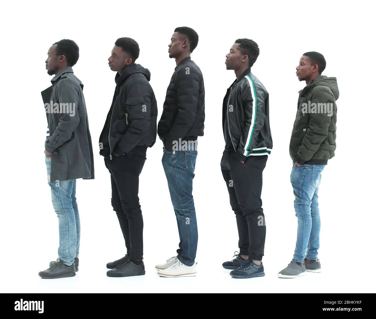 group of diverse guys standing in turns . isolated on white Stock Photo ...