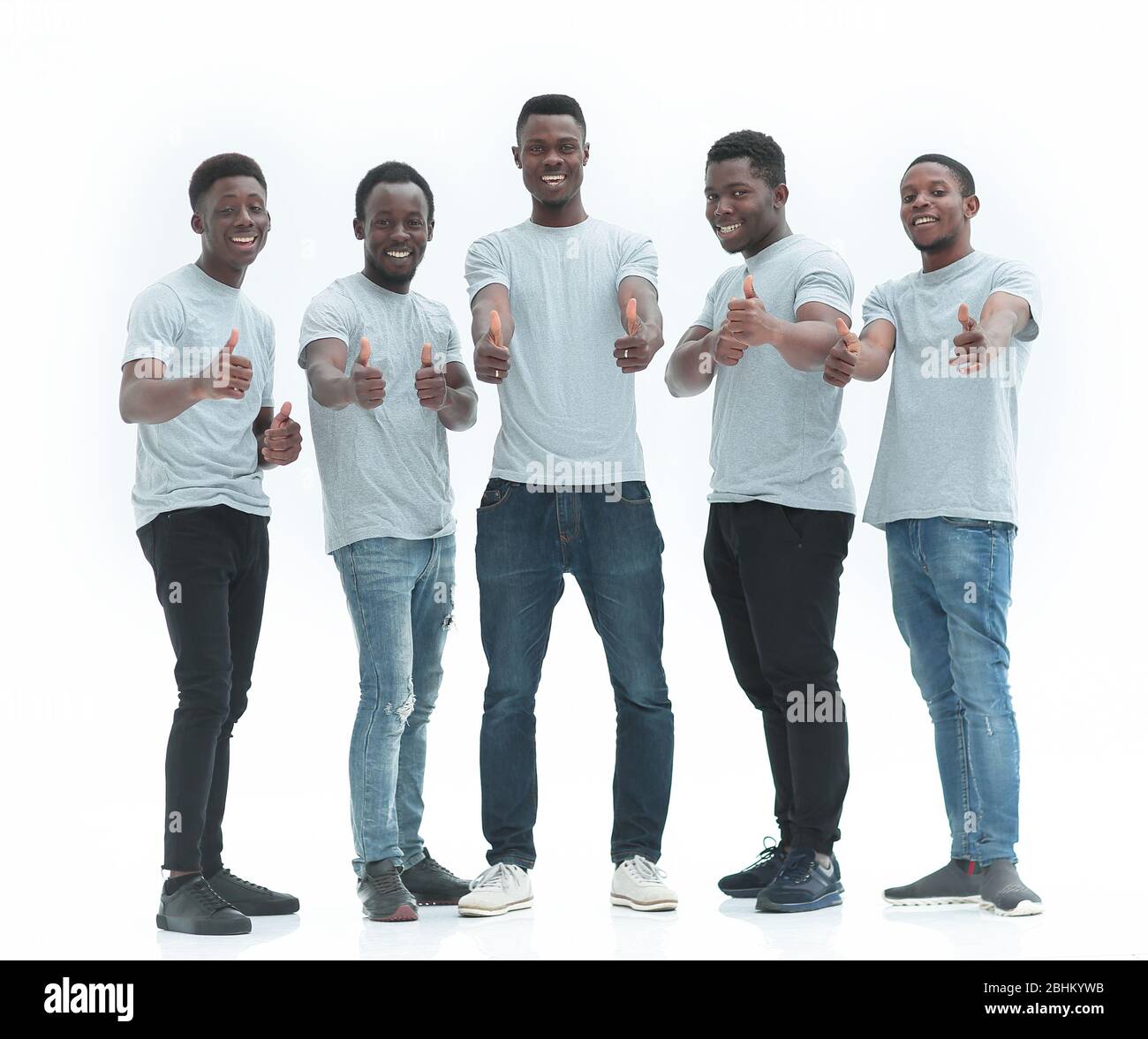 multi-ethnic group of happy guys showing thumbs up Stock Photo - Alamy