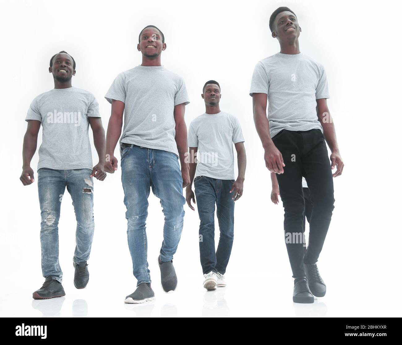 in full growth. team of young people stepping forward Stock Photo - Alamy