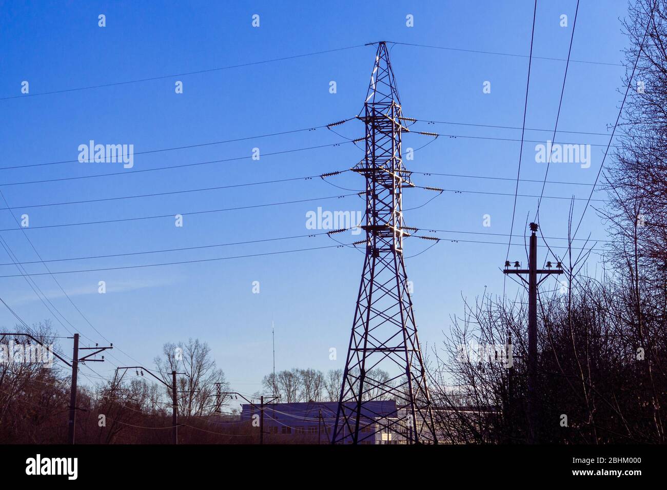 high voltage supports of two intersecting power lines of different ...