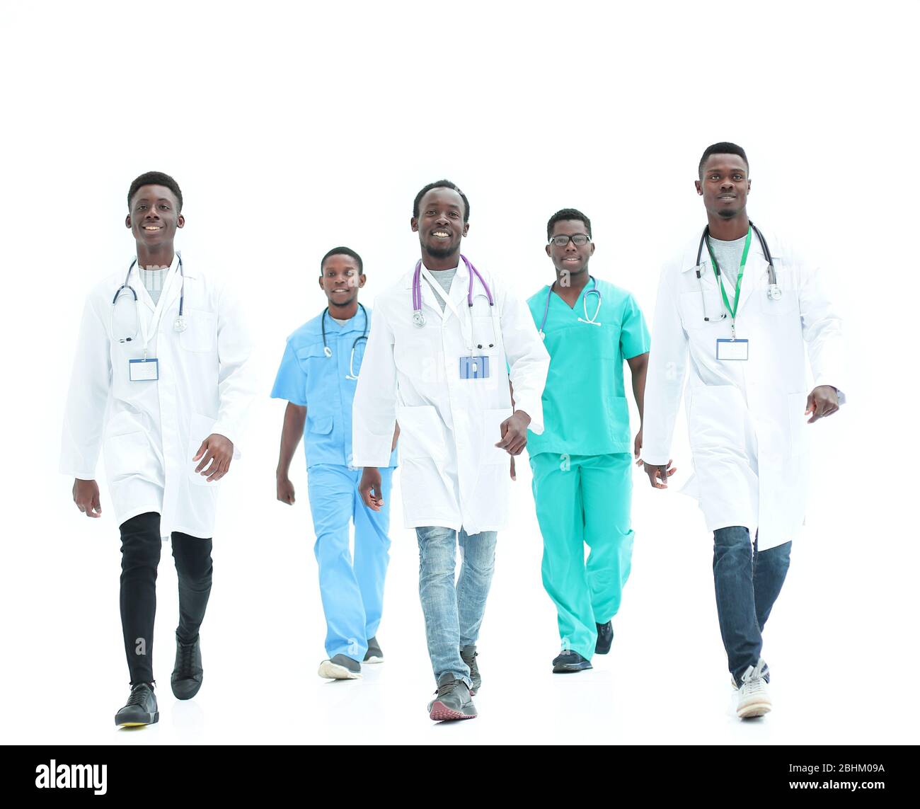 group of different doctors rush to the rescue. isolated on white Stock ...