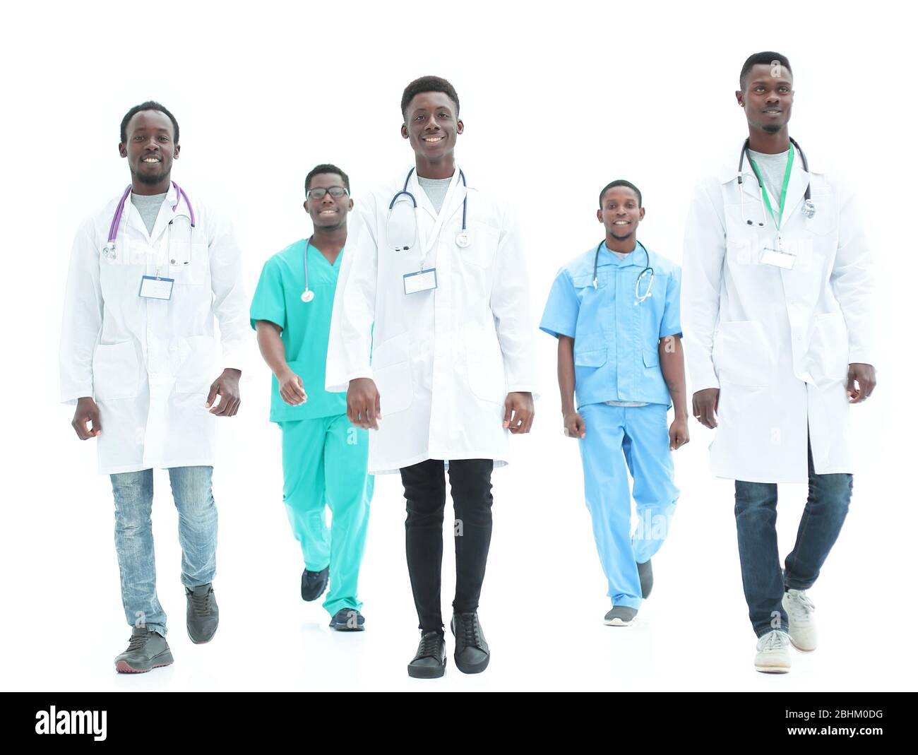 group of different doctors rush to the rescue. isolated on white Stock ...