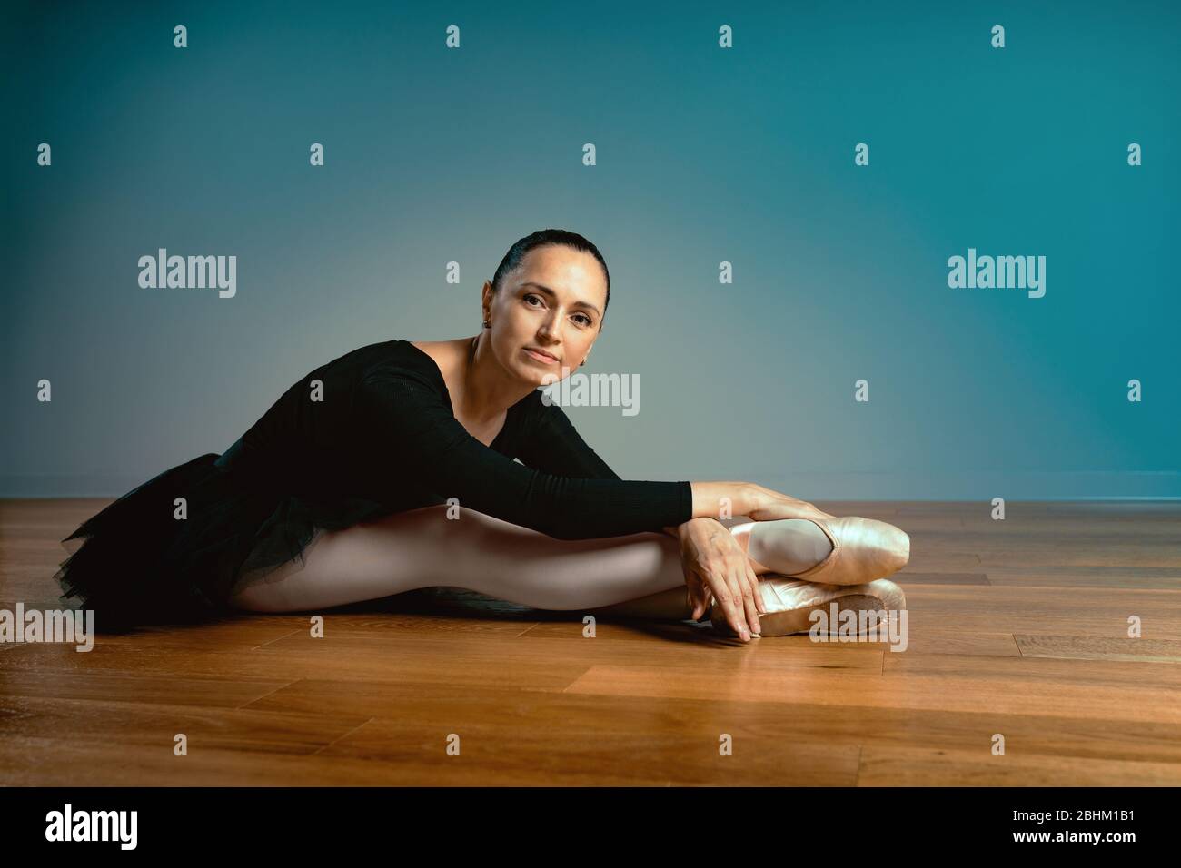 Activity in age, adult female ballet dancer, in great shape posing for ...