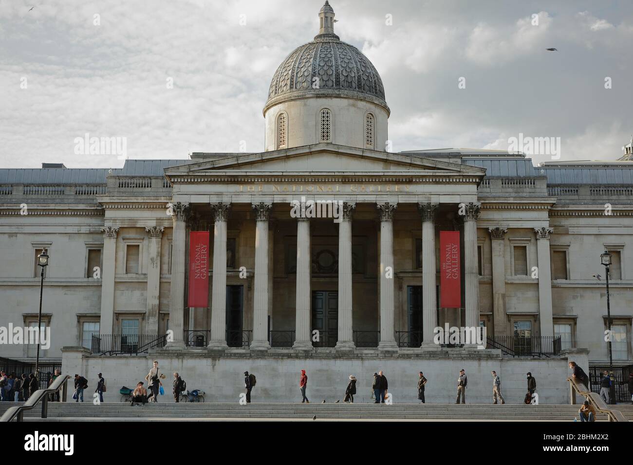 Trafalgar Square, London, UK: Homeless people line beneath the National ...