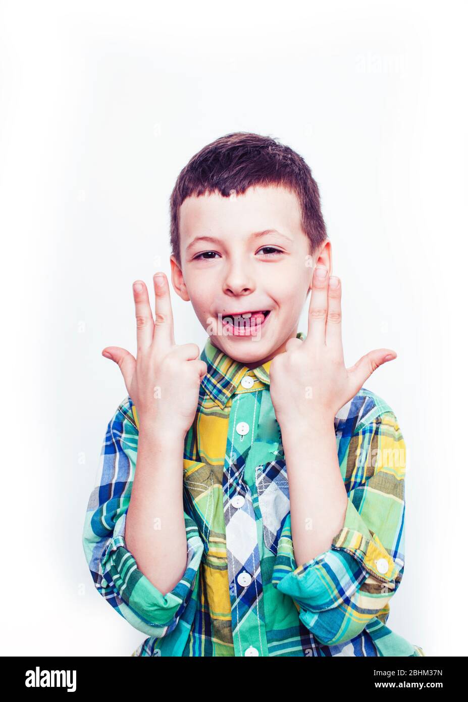 little cute real boy on white background gesture smiling close up ...