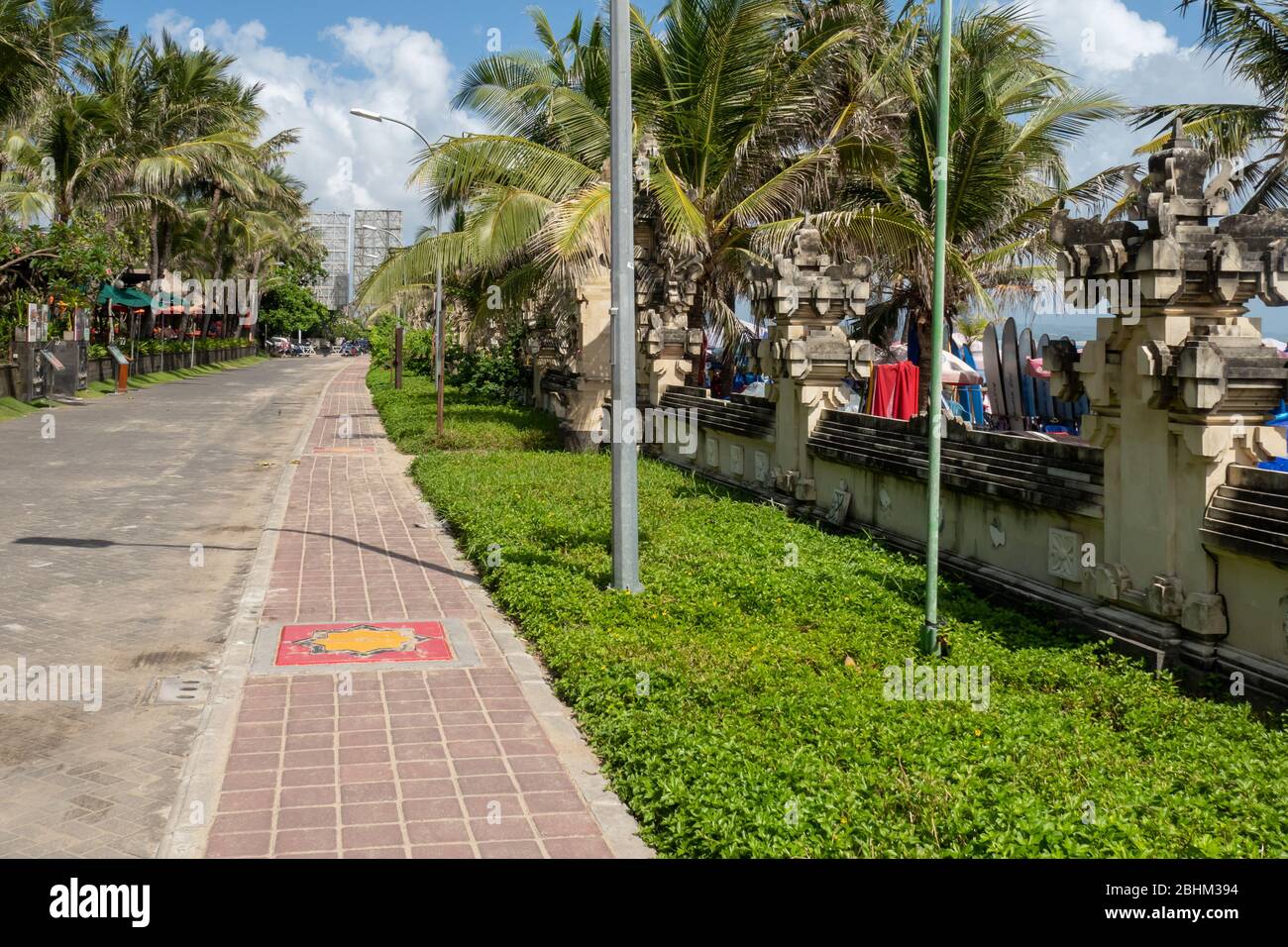 Pathway between the Hotel resorts and the beach with traditional ornate ...