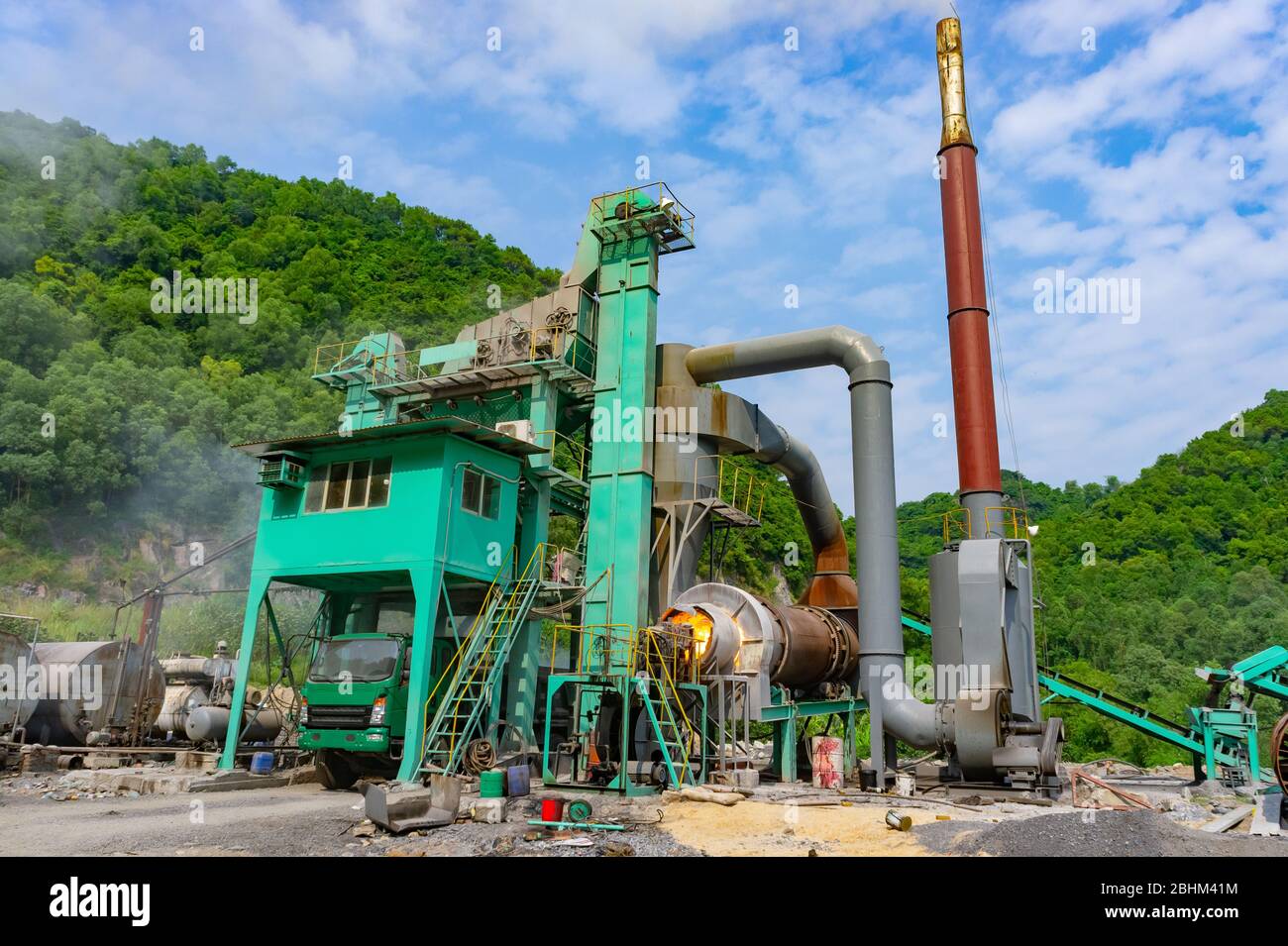 Asphalt hot mix plant. It is consists of cold aggregate system, drying ...