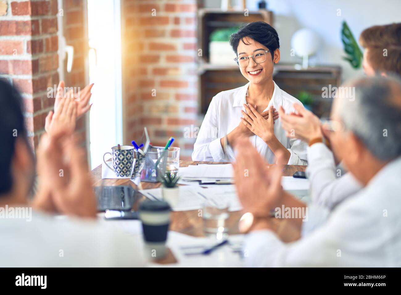 Group of business workers smiling happy and confident. Working together ...