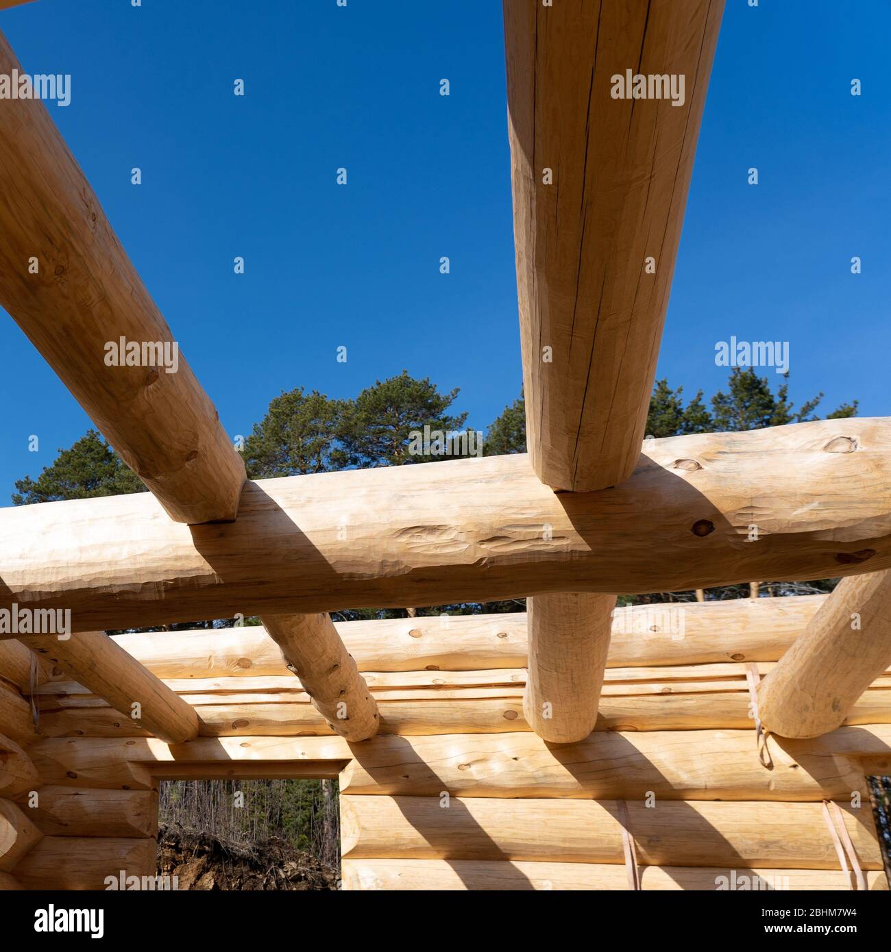 Ethnic wooden log cabin new manufacturing process Stock Photo - Alamy