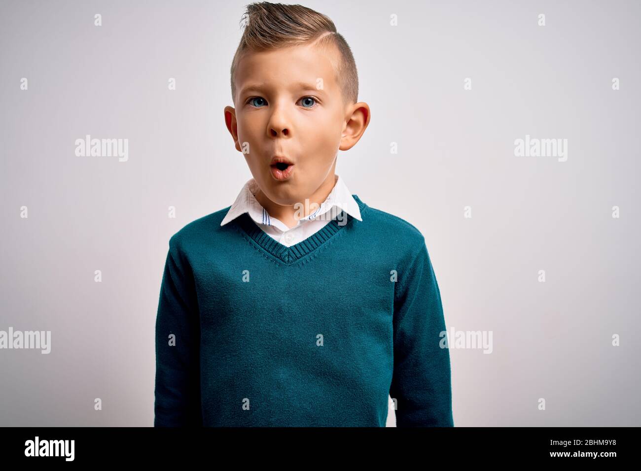 Young little caucasian kid with blue eyes standing wearing elegant ...