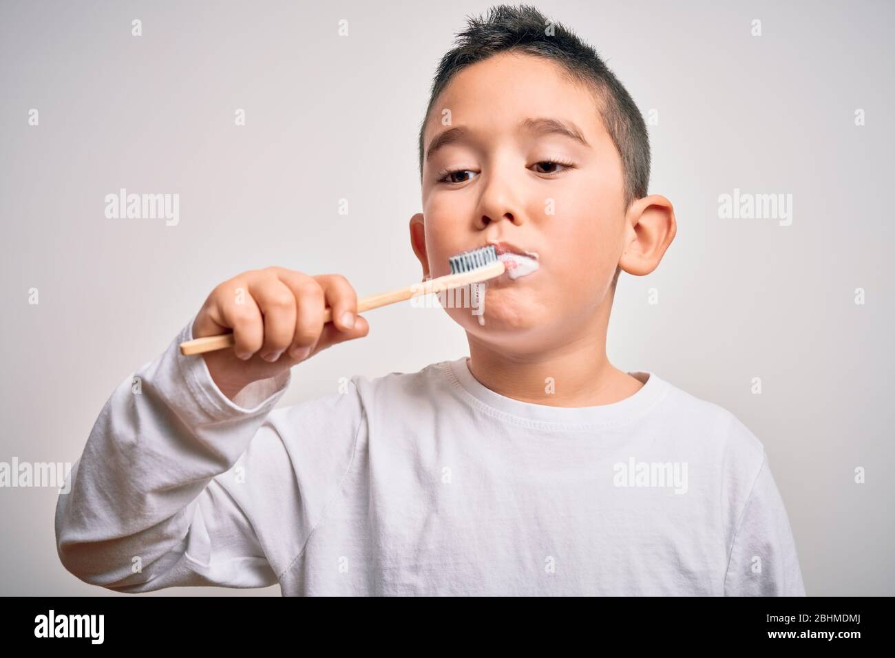 Hispanic boy brush teeth hi-res stock photography and images - Alamy