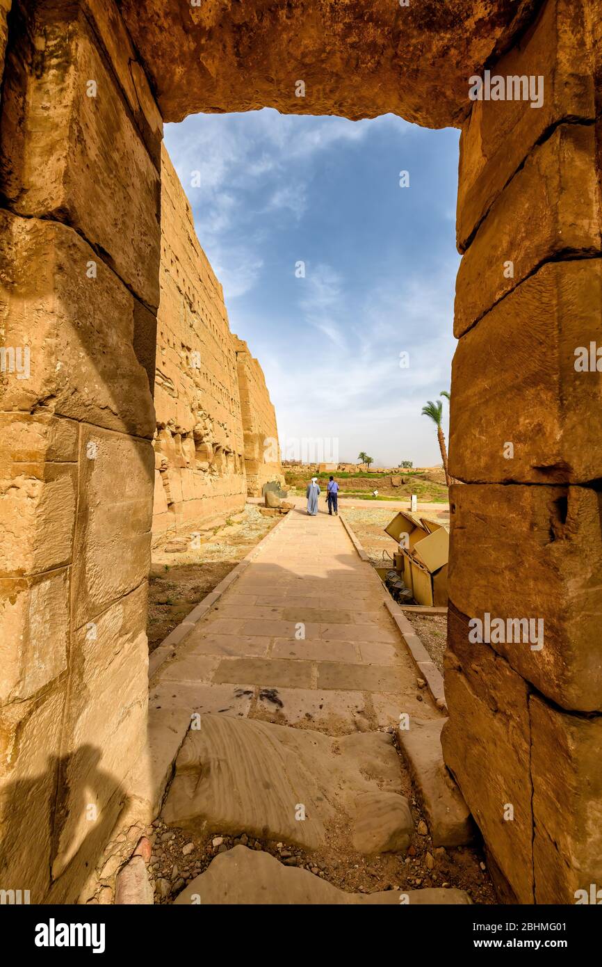Walking along the north face of Hatshepsut’s Eighth Pylon of Karnak ...