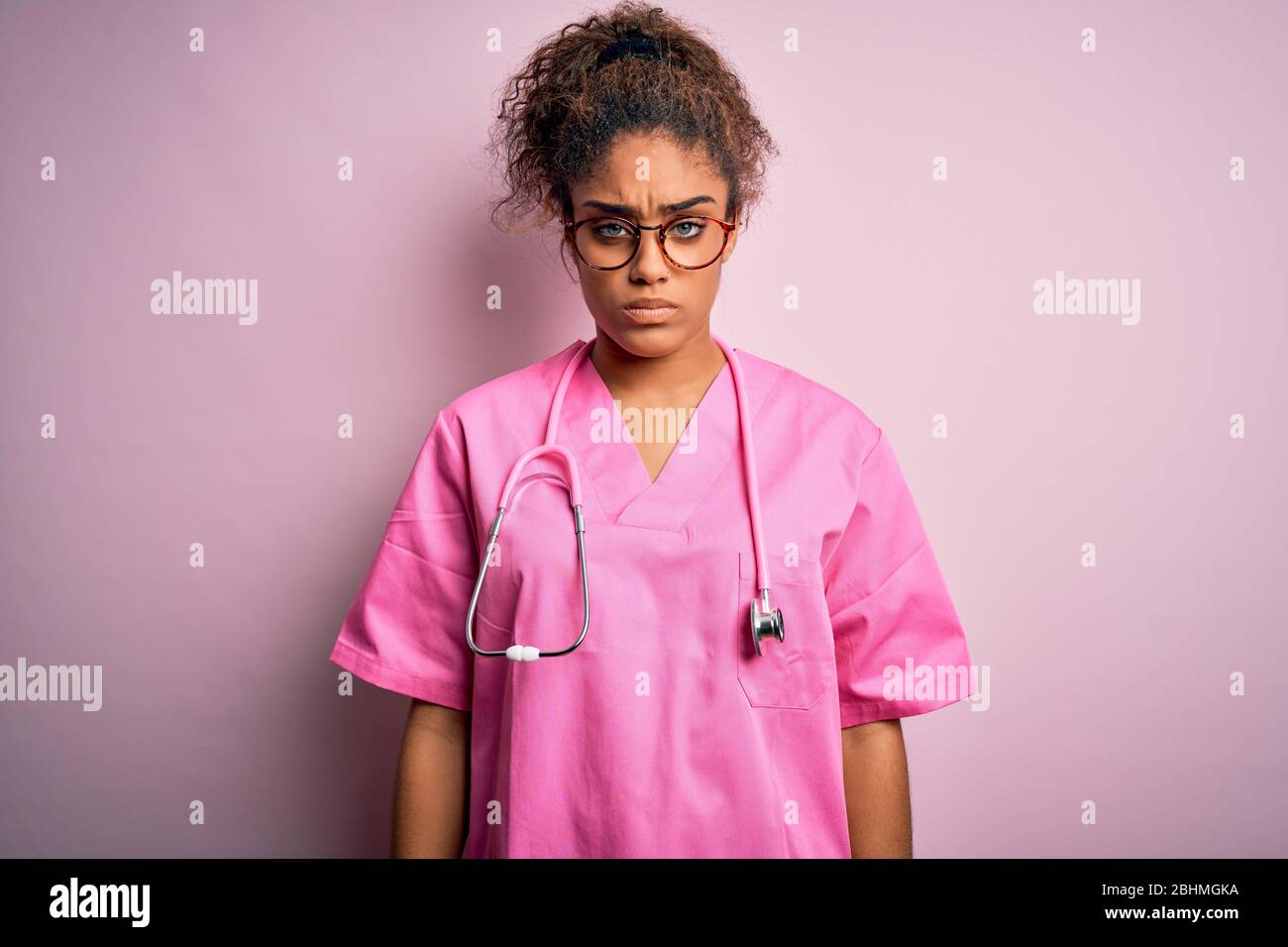 African american nurse girl wearing medical uniform and stethoscope ...