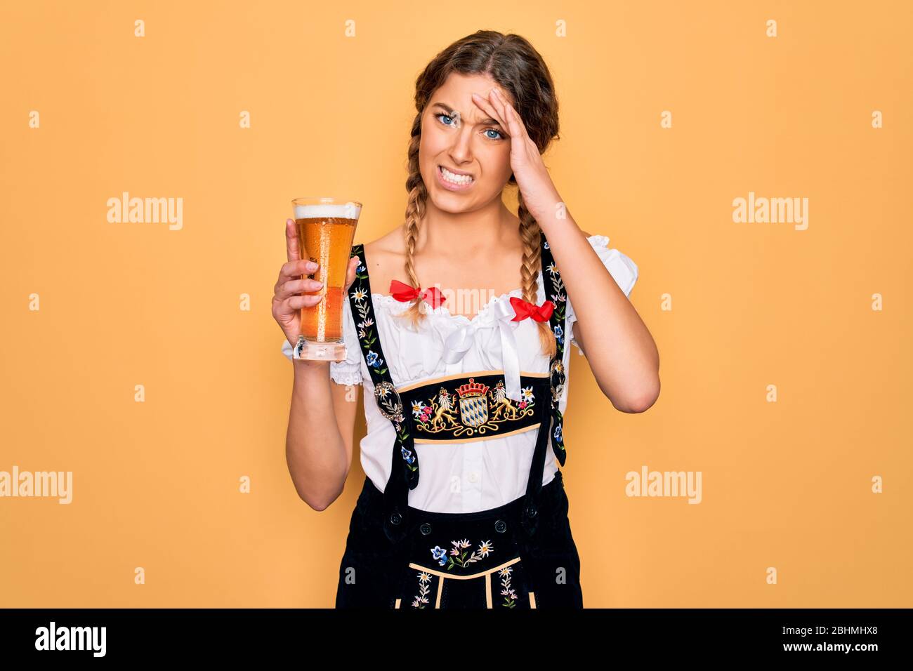 Beautiful blonde german woman with blue eyes wearing octoberfest dress ...