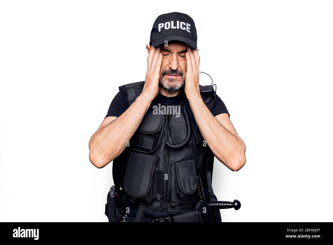 Middle age policeman wearing police uniform and bulletproof vest over ...