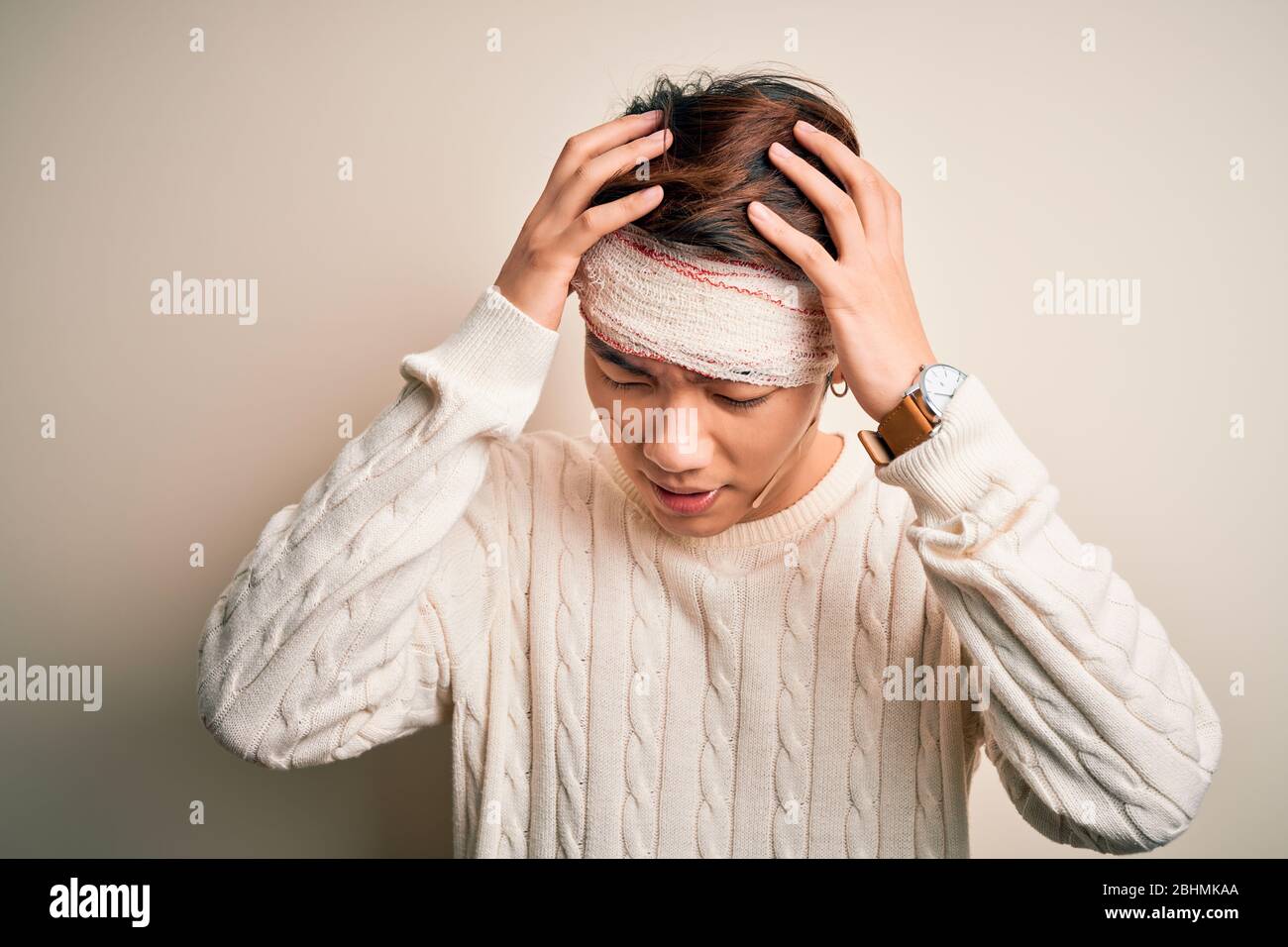 Young handsome chinese man injured for accident wearing bandage and ...