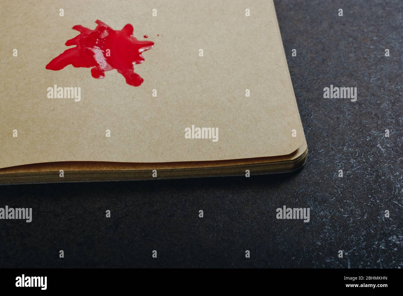 Blood splatter painted on yellow paper Stock Photo - Alamy