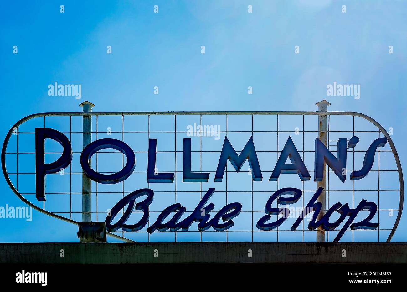 The Pollman’s Bake Shop sign is silhouetted in the sun, April 24, 2020 ...
