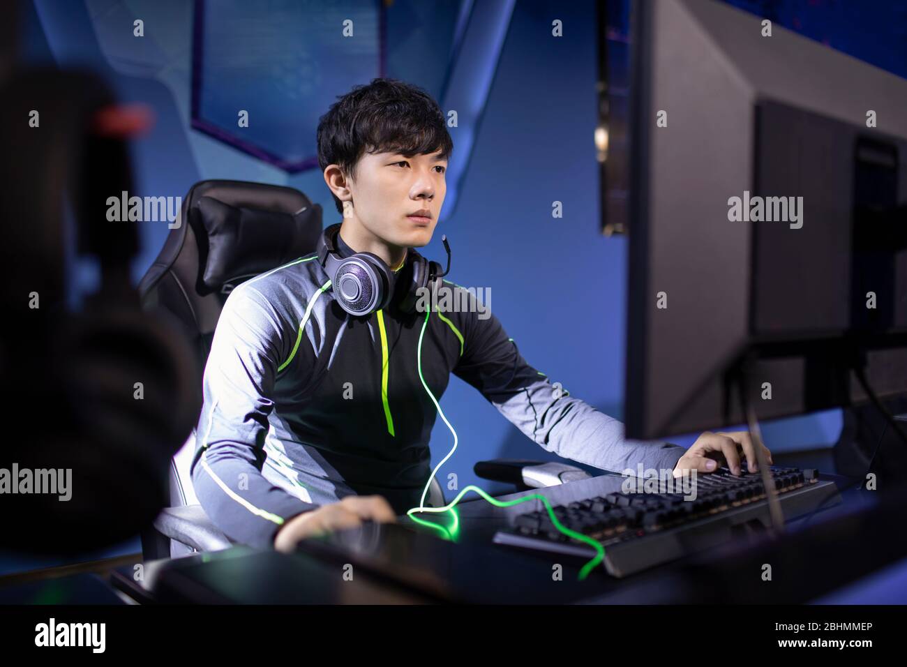 Athlete asian man using wireless hi-res stock photography and images ...