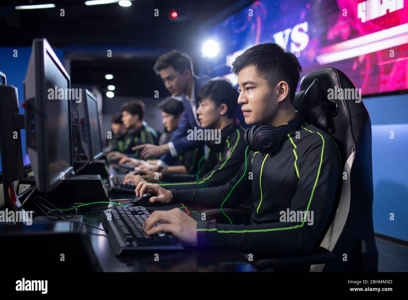 Young Chinese men playing esports Stock Photo - Alamy