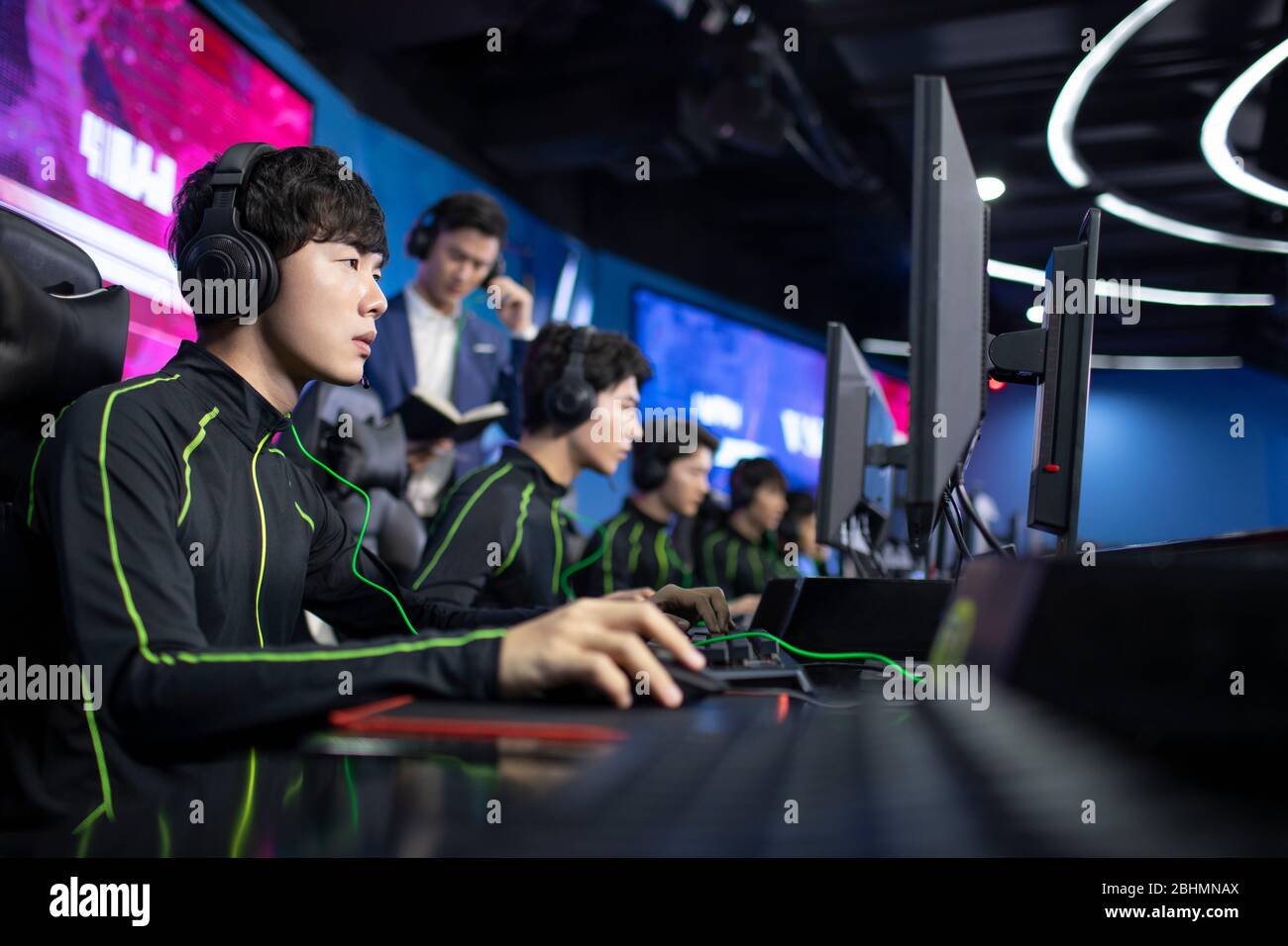 Young Chinese men playing esports Stock Photo - Alamy