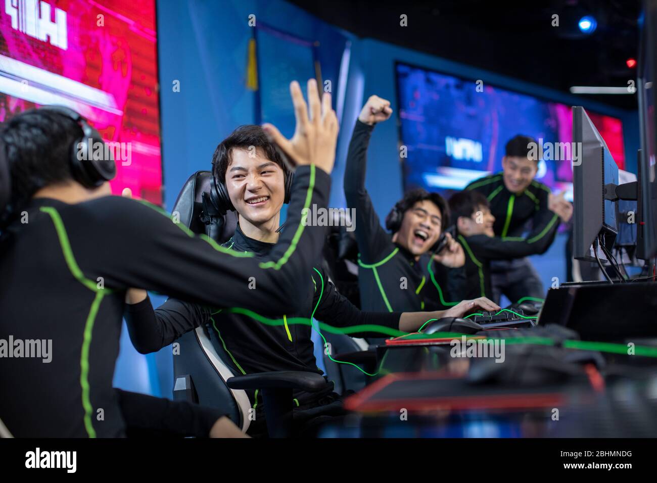 Playing video games high five hi-res stock photography and images - Alamy