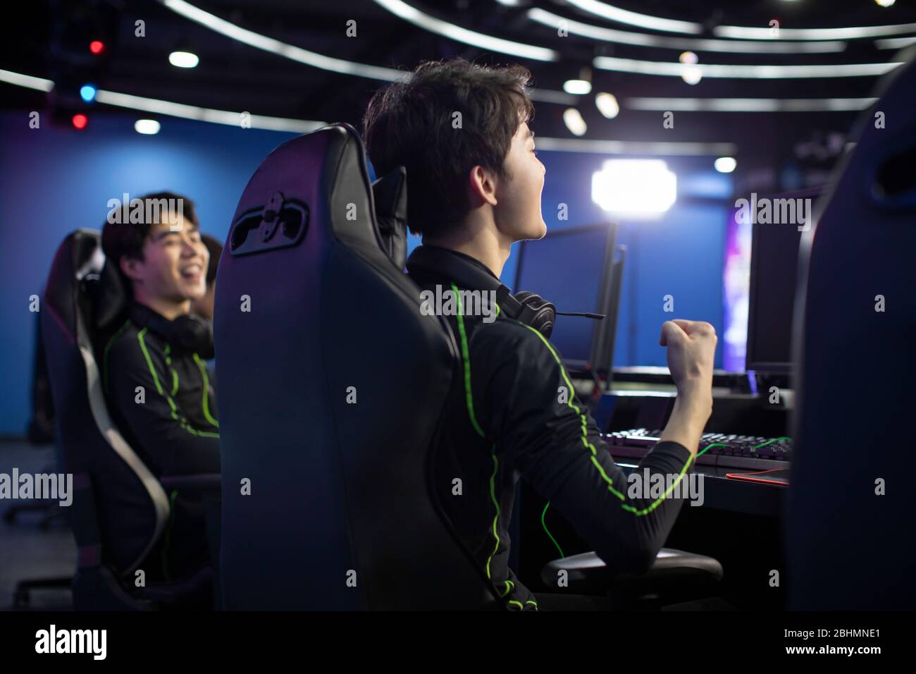 Young Chinese men playing esports Stock Photo - Alamy