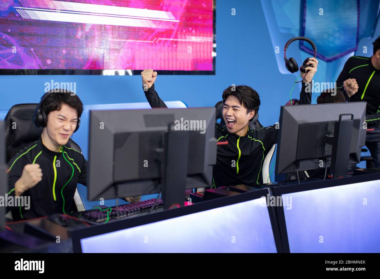 Young Chinese men playing esports Stock Photo - Alamy