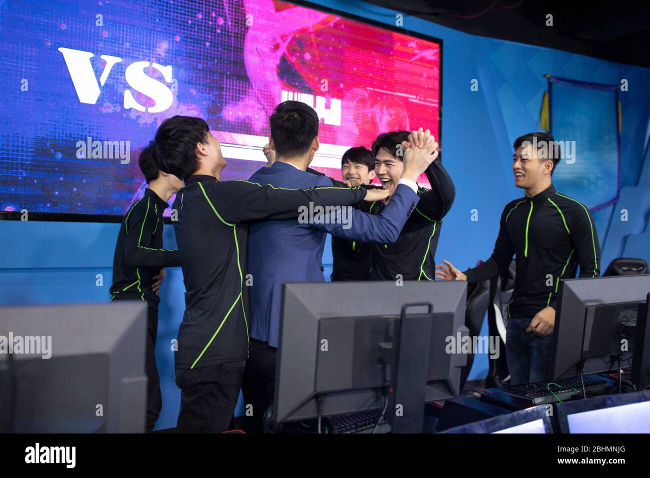 Young Chinese men playing esports Stock Photo - Alamy