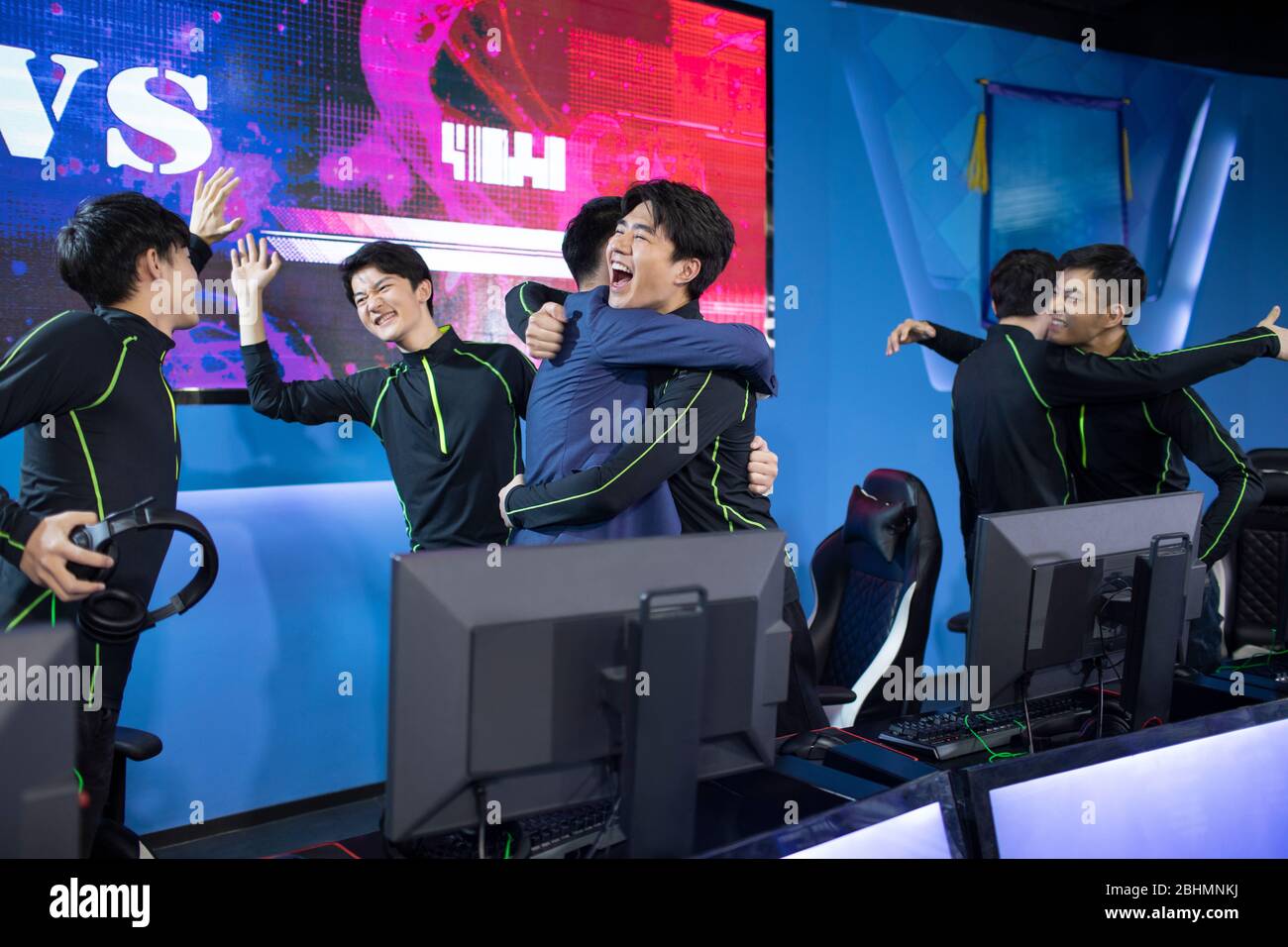 Young Chinese men playing esports Stock Photo - Alamy