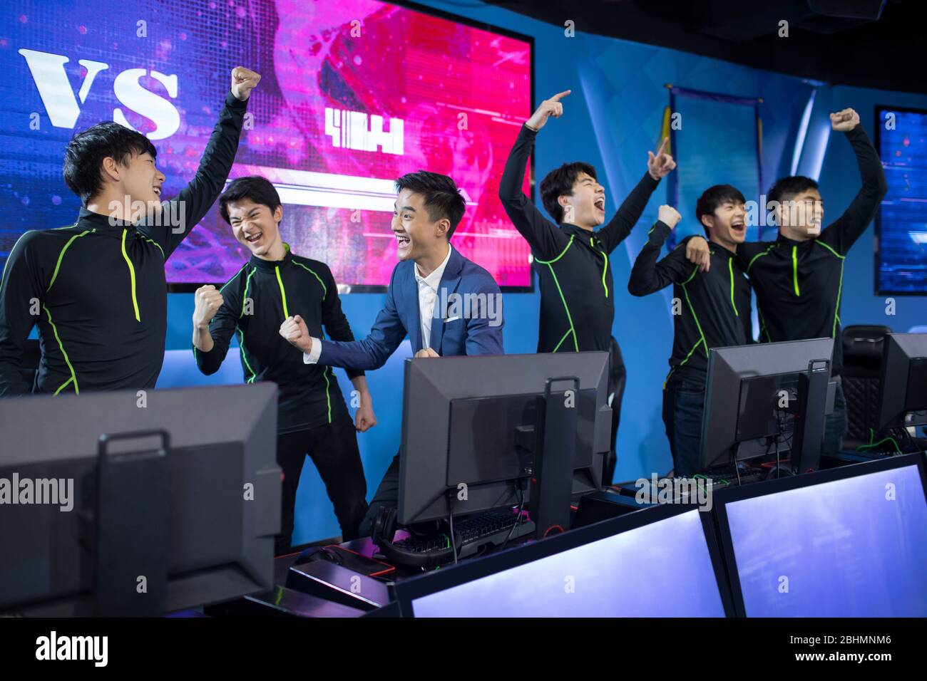 Young Chinese men playing esports Stock Photo - Alamy