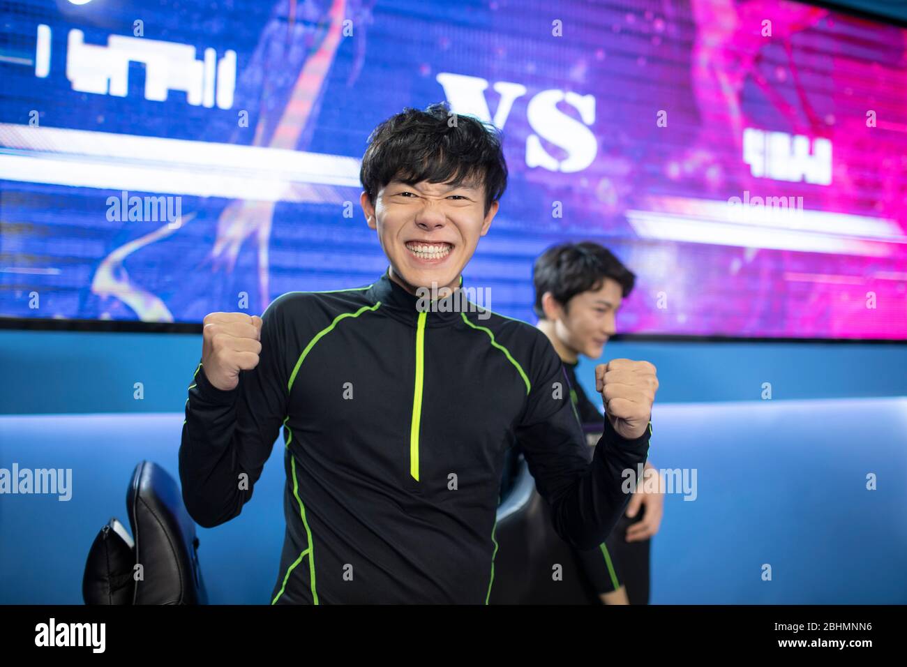 Young Chinese men playing esports Stock Photo - Alamy