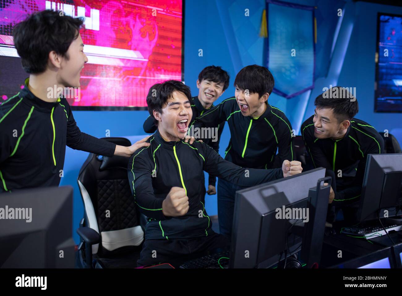 Young Chinese men playing esports Stock Photo - Alamy