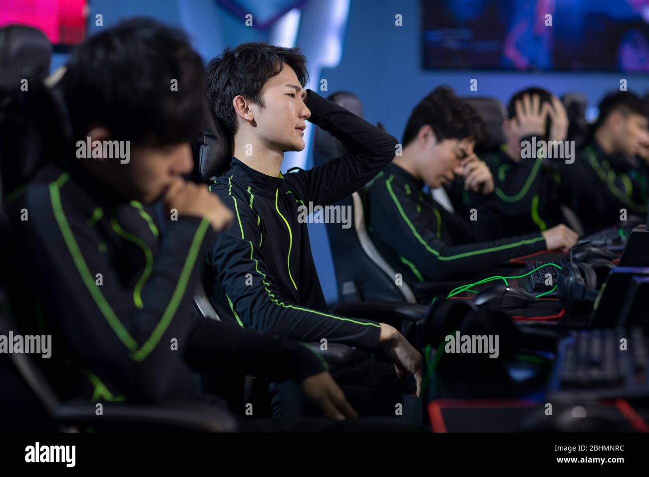 Young Chinese men playing esports Stock Photo - Alamy